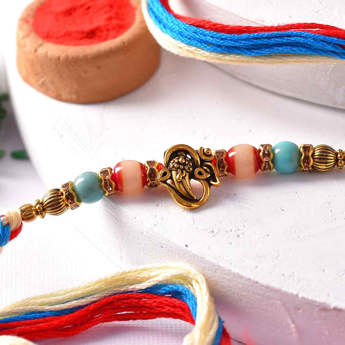 Designer Om Colourful Rakhi – TOKENZ